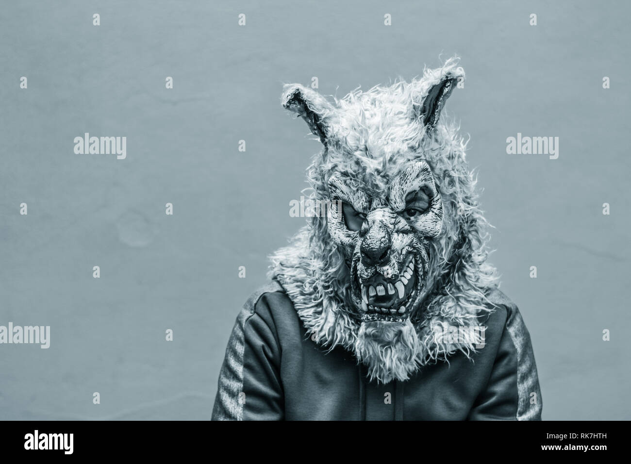 Photograph of a person with a wolf mask Stock Photo - Alamy