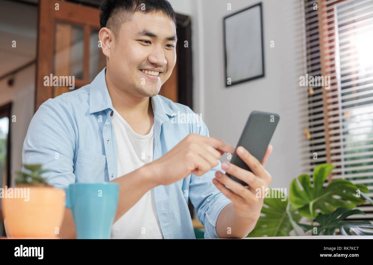 Asian male consumer hi-res stock photography and images - Alamy