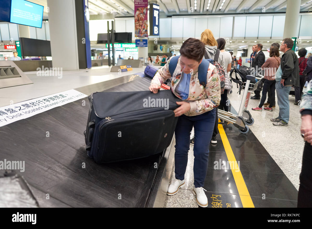 HONG KONG - APRIL 09, 2016: baggage claim area in Hong Kong ...