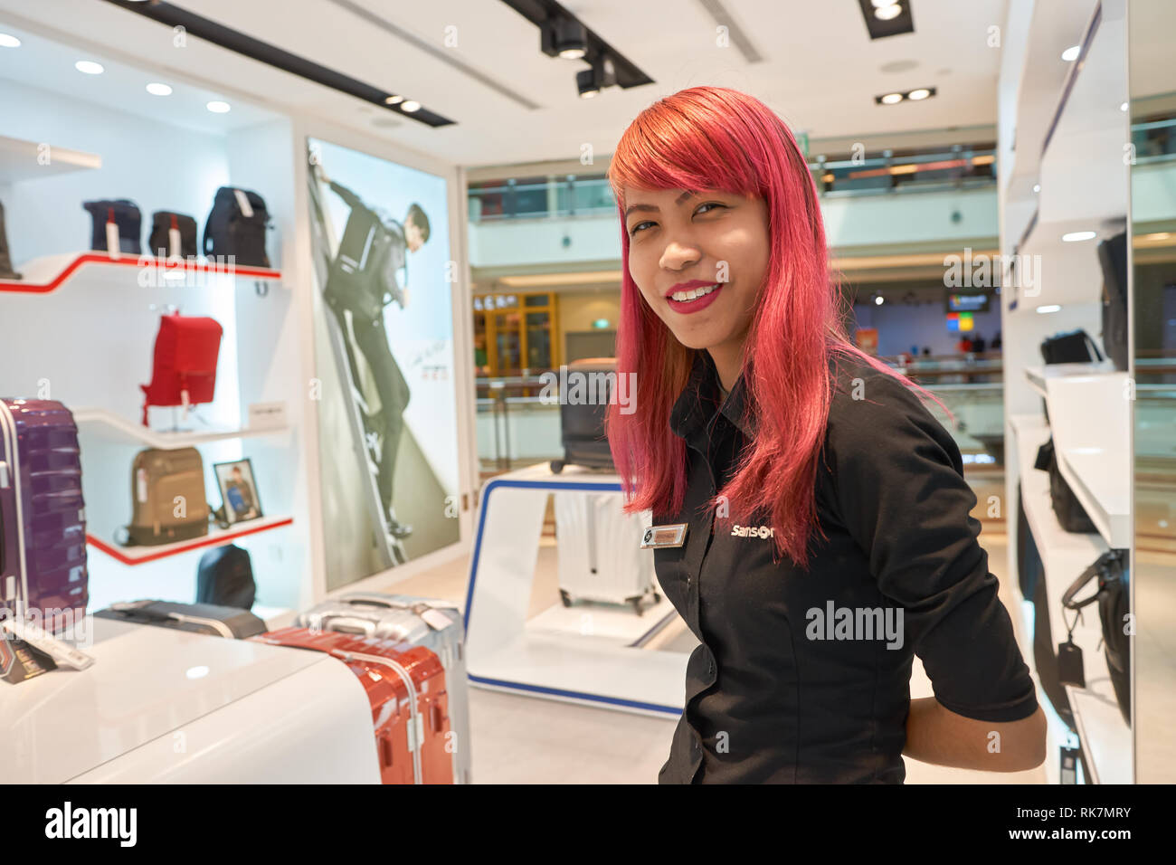 KUALA LUMPUR, MALAYSIA - MAY 09, 2016: portrait of seller in Samsonite ...