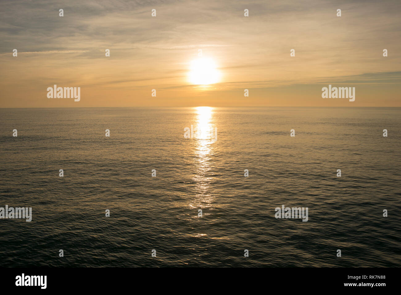 A beautiful sunrise in the calm sea, Spain Stock Photo - Alamy
