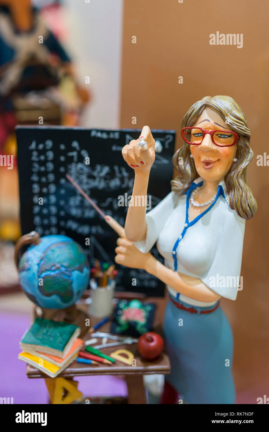 colorful figure of the teacher. The concept of education. vertical ...