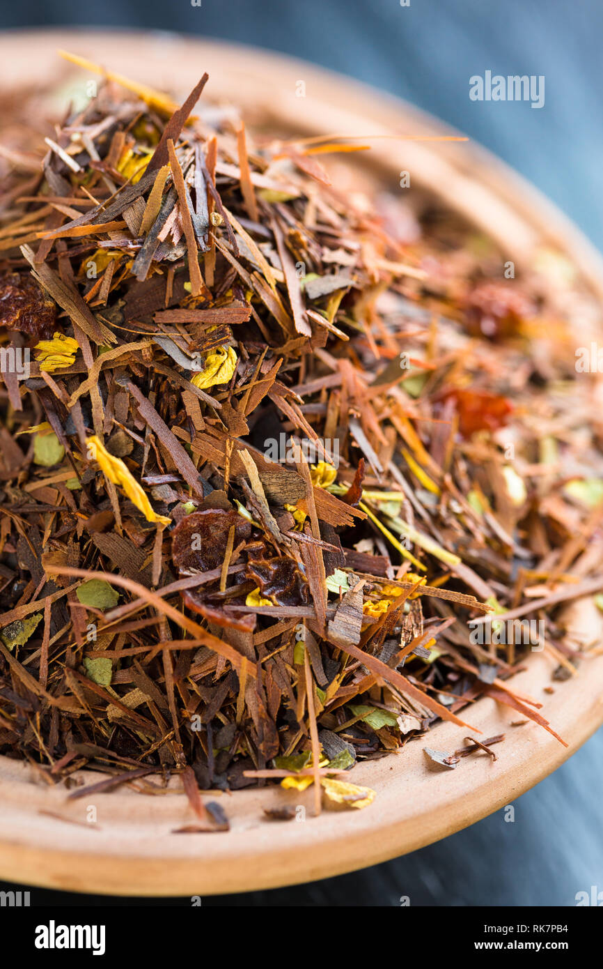 Dried Rooibos tea with fruits and flowers Stock Photo - Alamy