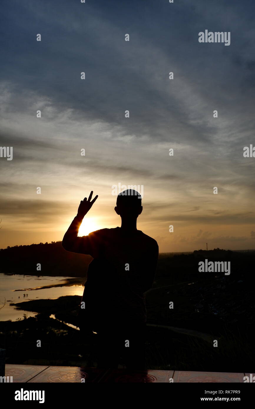 silhouette man sunset Stock Photo - Alamy
