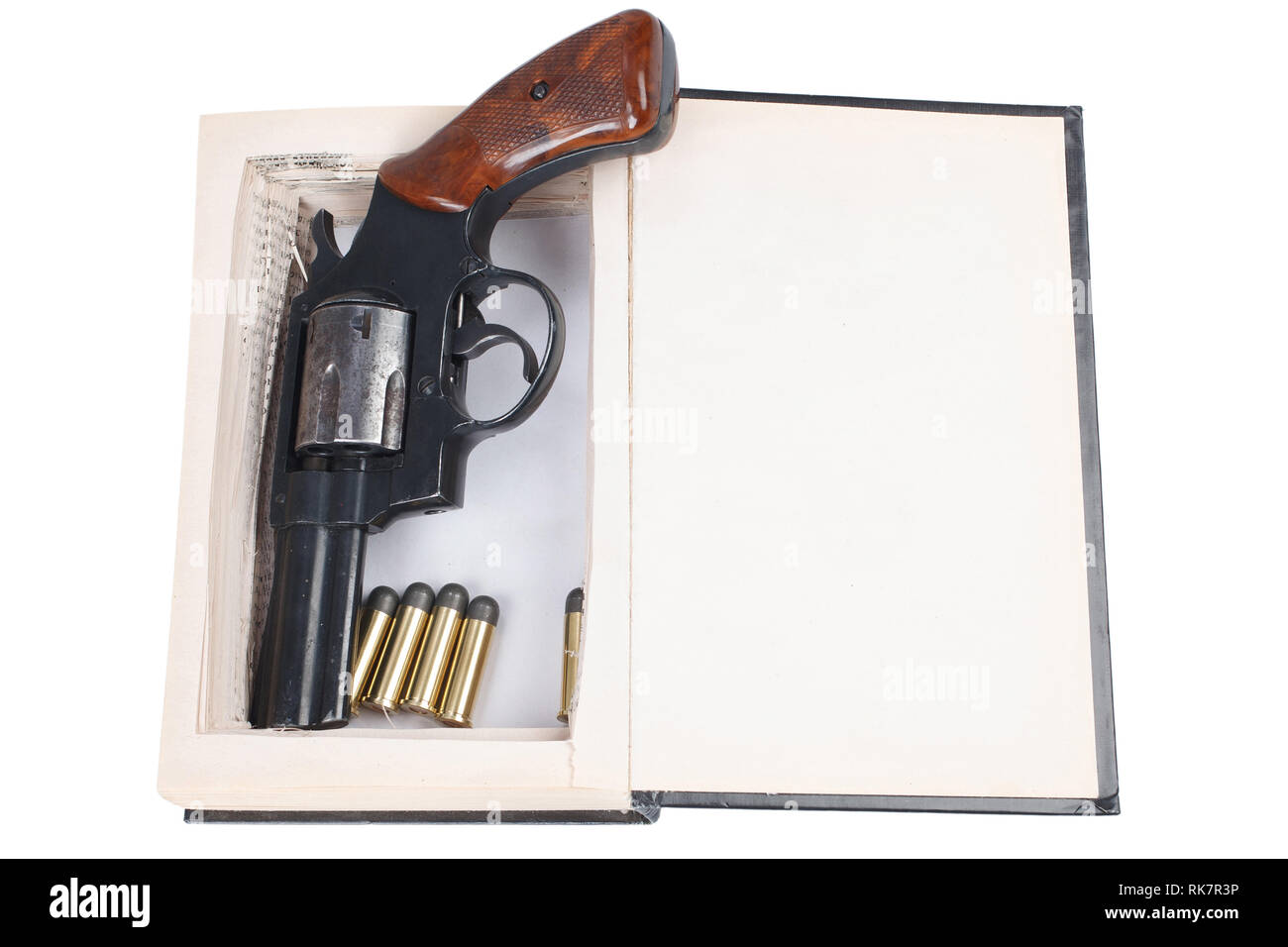 A gun hidden inside a book isolated on white background Stock Photo - Alamy