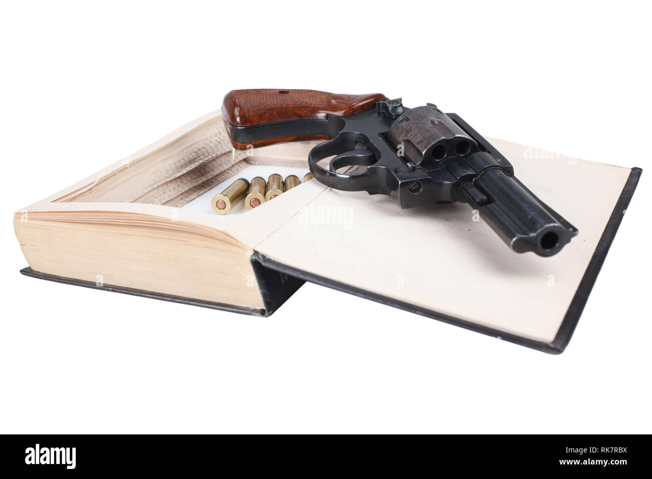 A gun hidden inside a book isolated on white background Stock Photo - Alamy