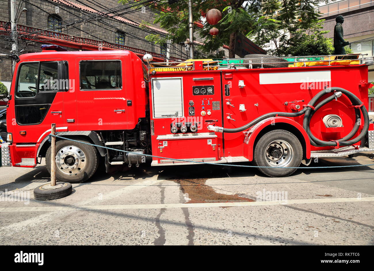 Red fire engine in shift hours parked at Ongpin Street off the Minor ...