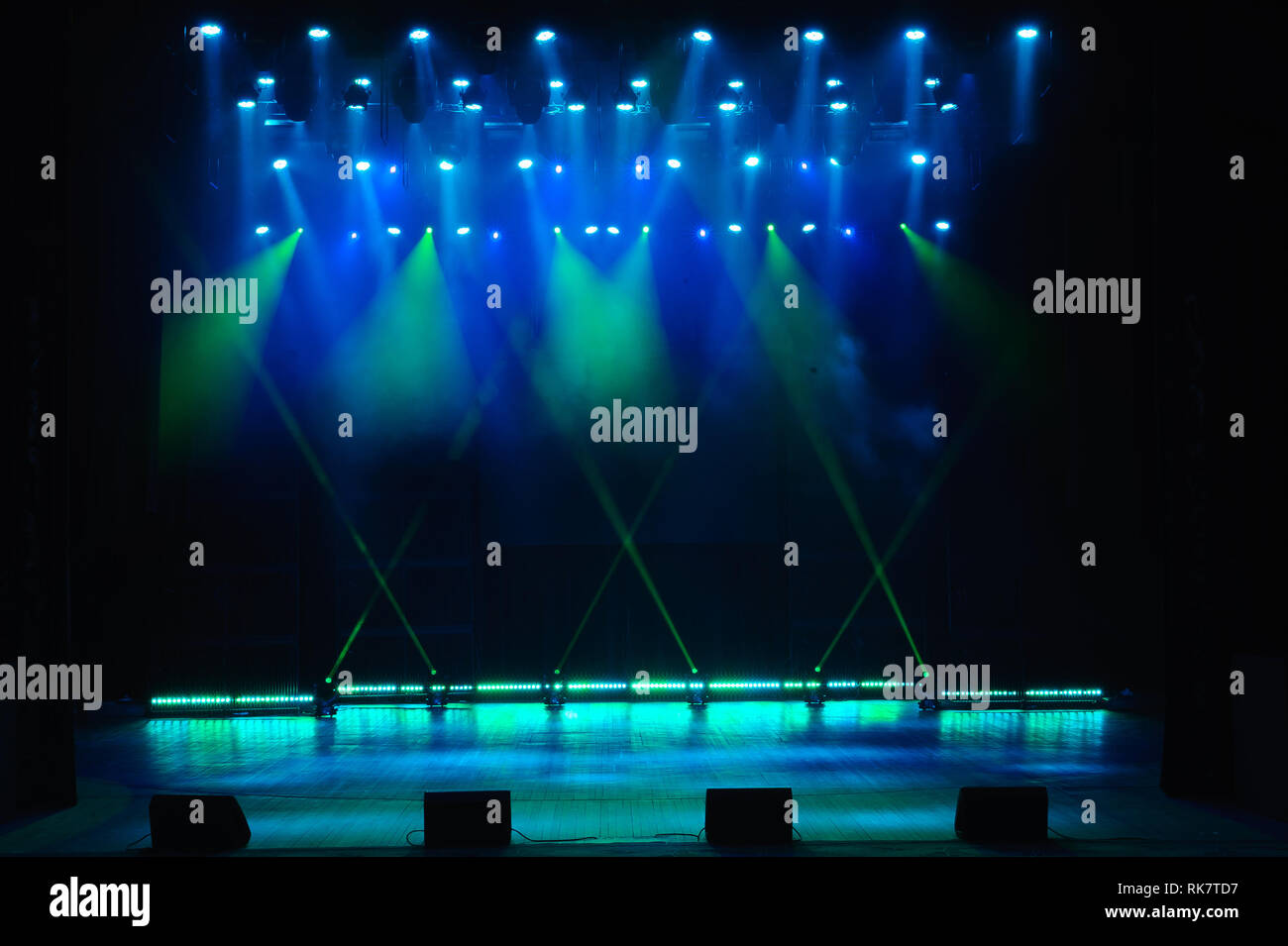 Free stage with lights, lighting devices. Night show Stock Photo - Alamy