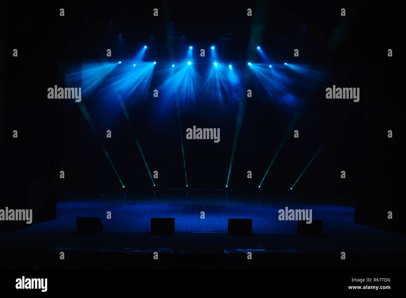 Free stage with lights, lighting devices. Night show Stock Photo - Alamy