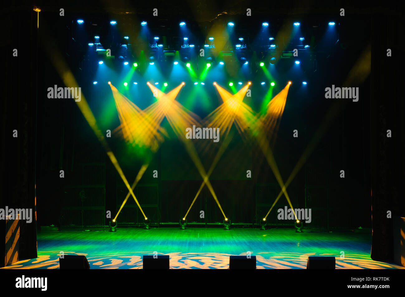 Free stage with lights, lighting devices. Night show Stock Photo - Alamy
