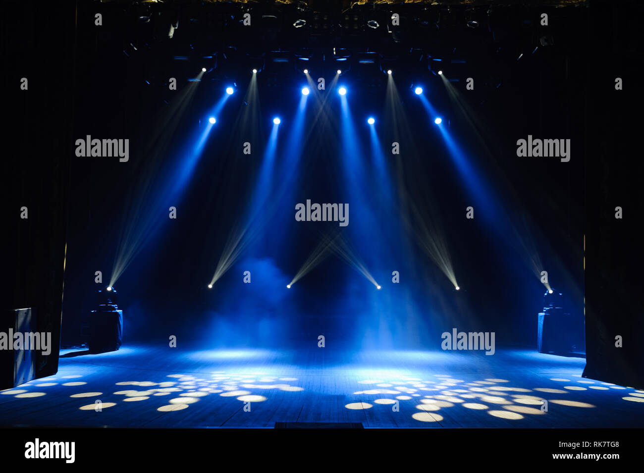 Free stage with lights, lighting devices. Night show Stock Photo - Alamy