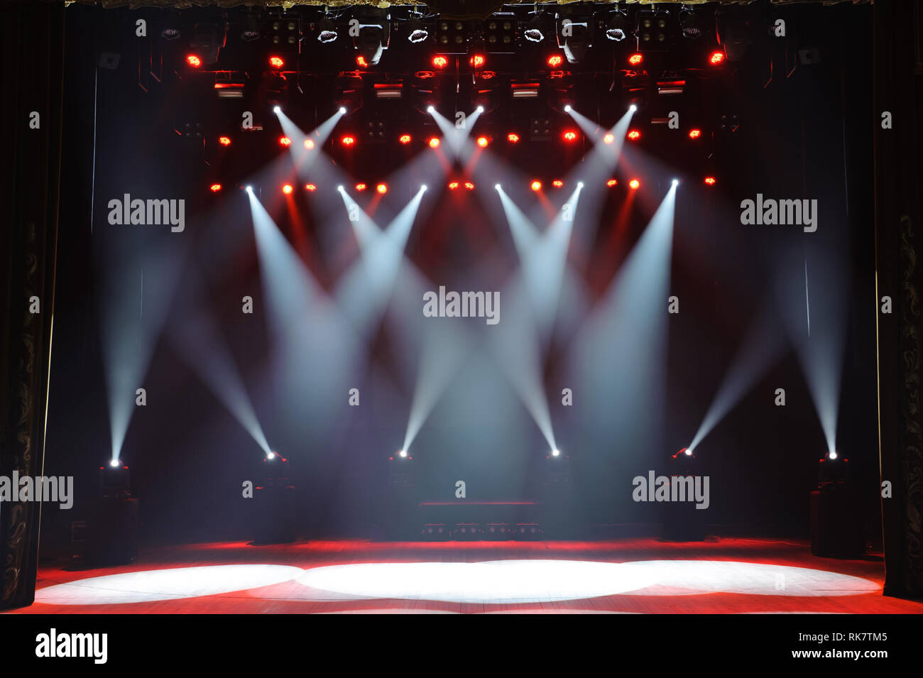 Free stage with lights, lighting devices. Night show Stock Photo - Alamy