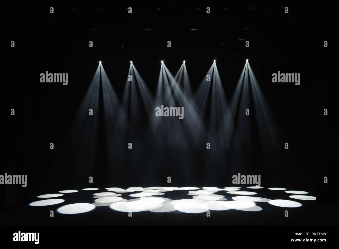 Free stage with lights, lighting devices. Night show Stock Photo - Alamy