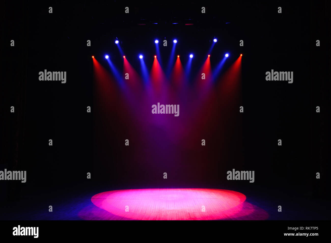 Free stage with lights, lighting devices. Night show Stock Photo - Alamy