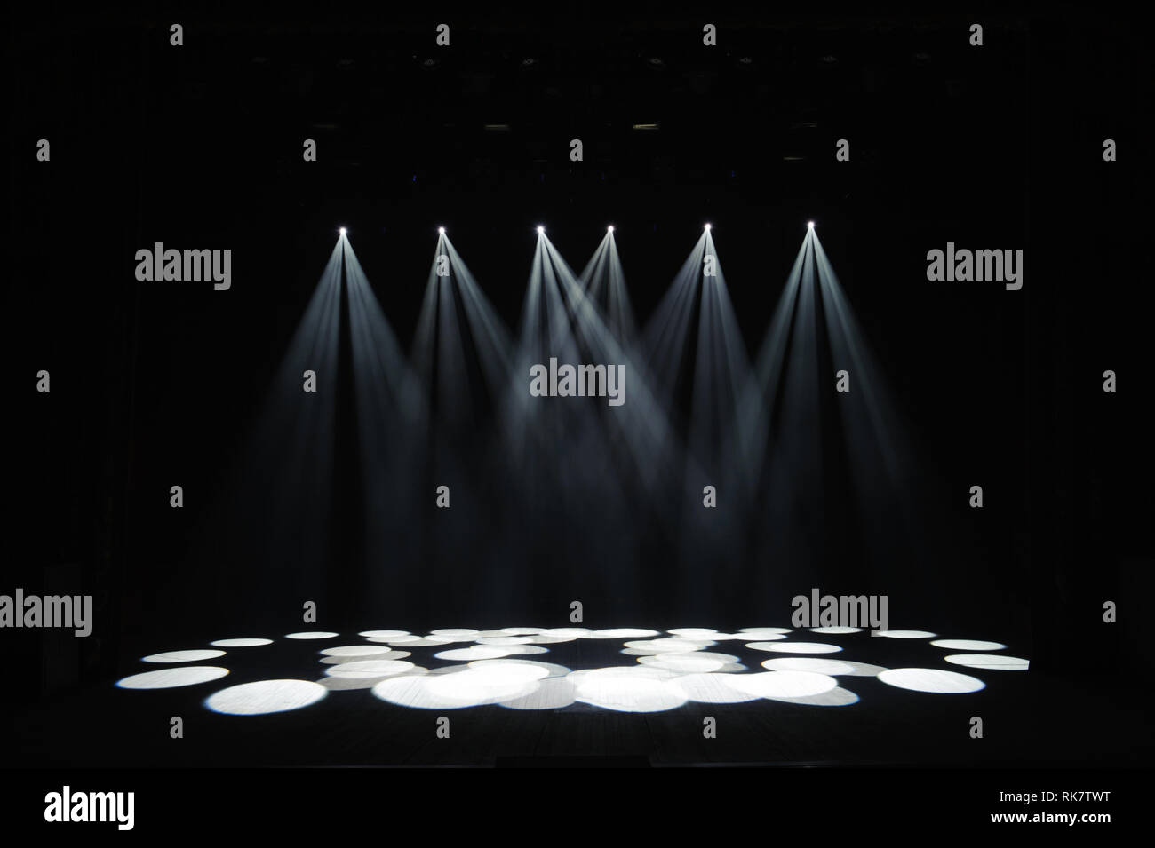 Free stage with lights, lighting devices. Night show Stock Photo - Alamy
