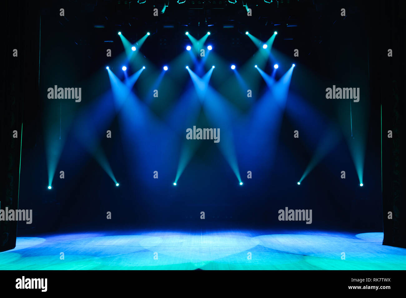 Free stage with lights, lighting devices. Night show Stock Photo - Alamy