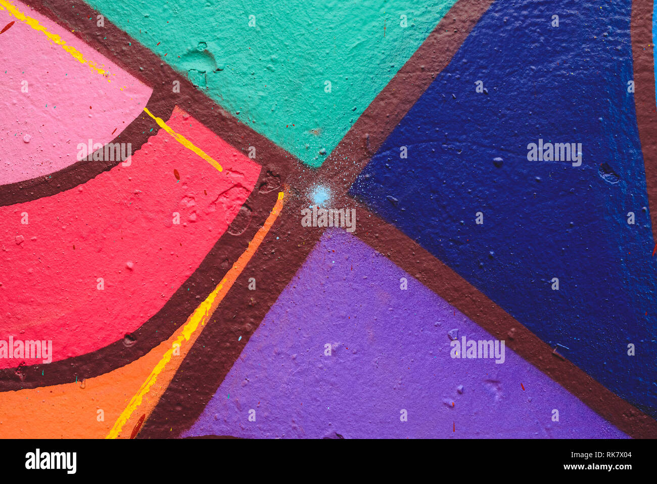 Detail of an anonymous street graffiti with many colors, cheerful urban ...