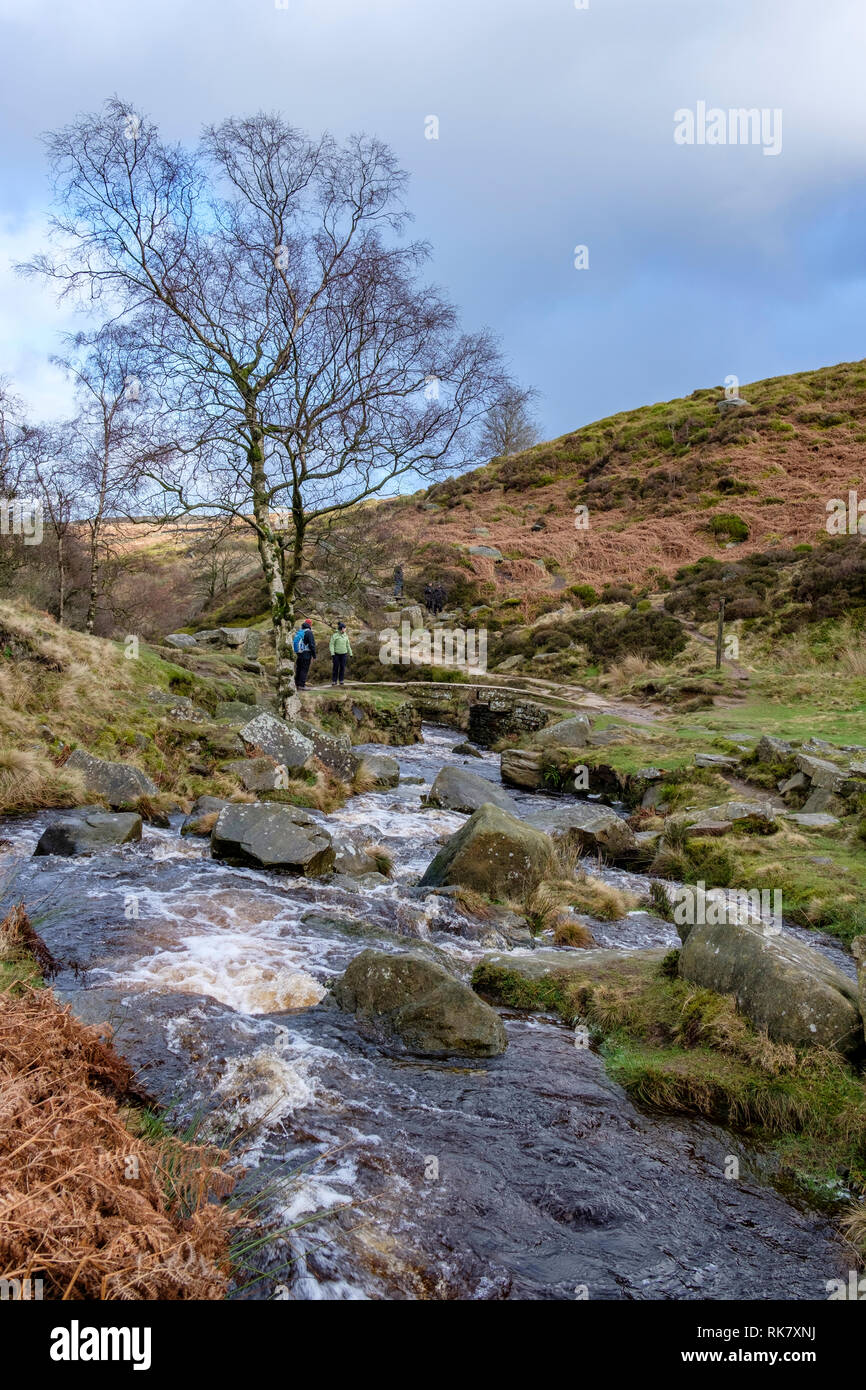 Tourists and Walkers at Bronte Bridge on The Bronte way on Haworth Moor ...
