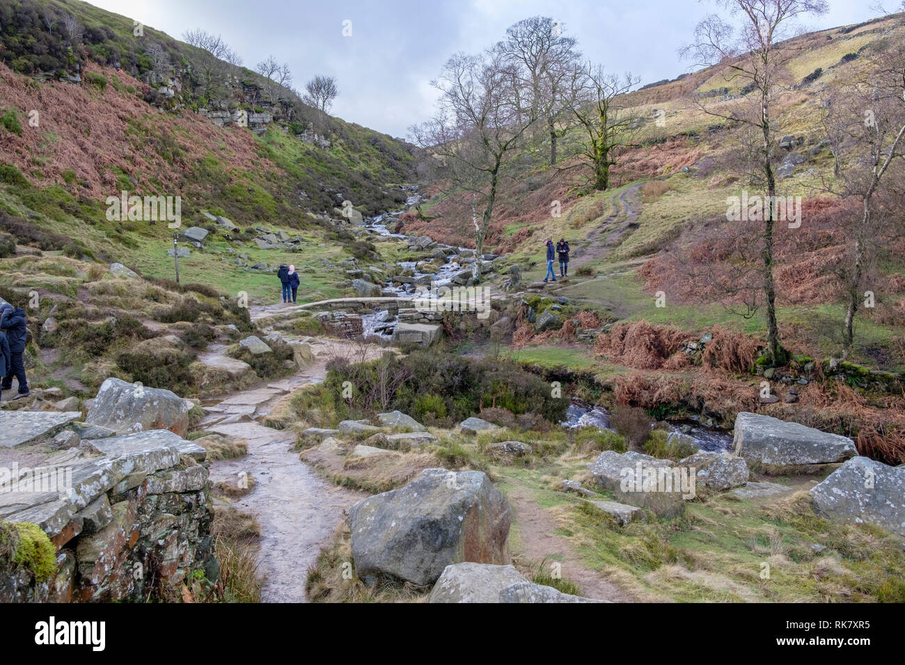 Tourists and Walkers at Bronte Bridge on The Bronte way on Haworth Moor ...