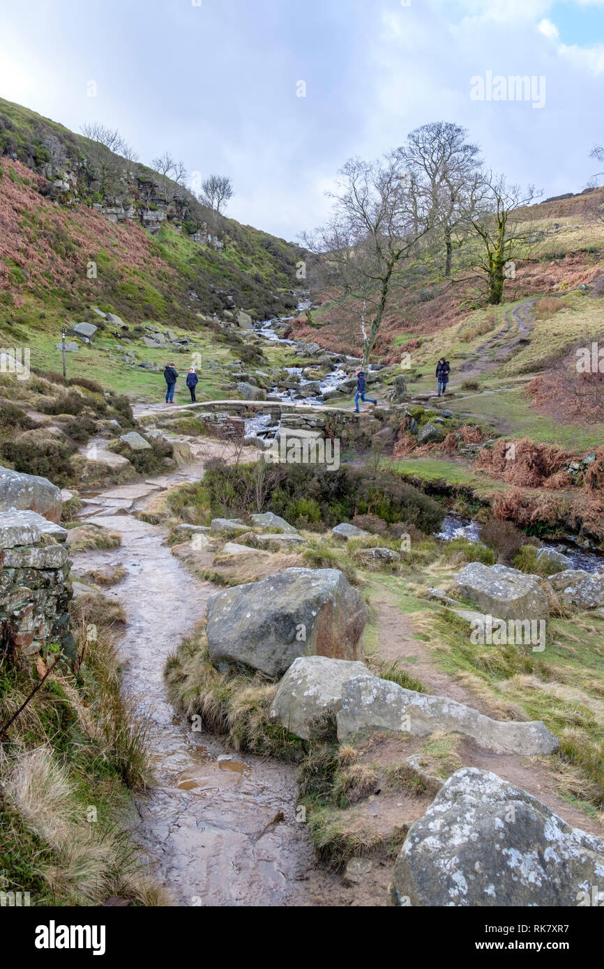 Tourists and Walkers at Bronte Bridge on The Bronte way on Haworth Moor ...