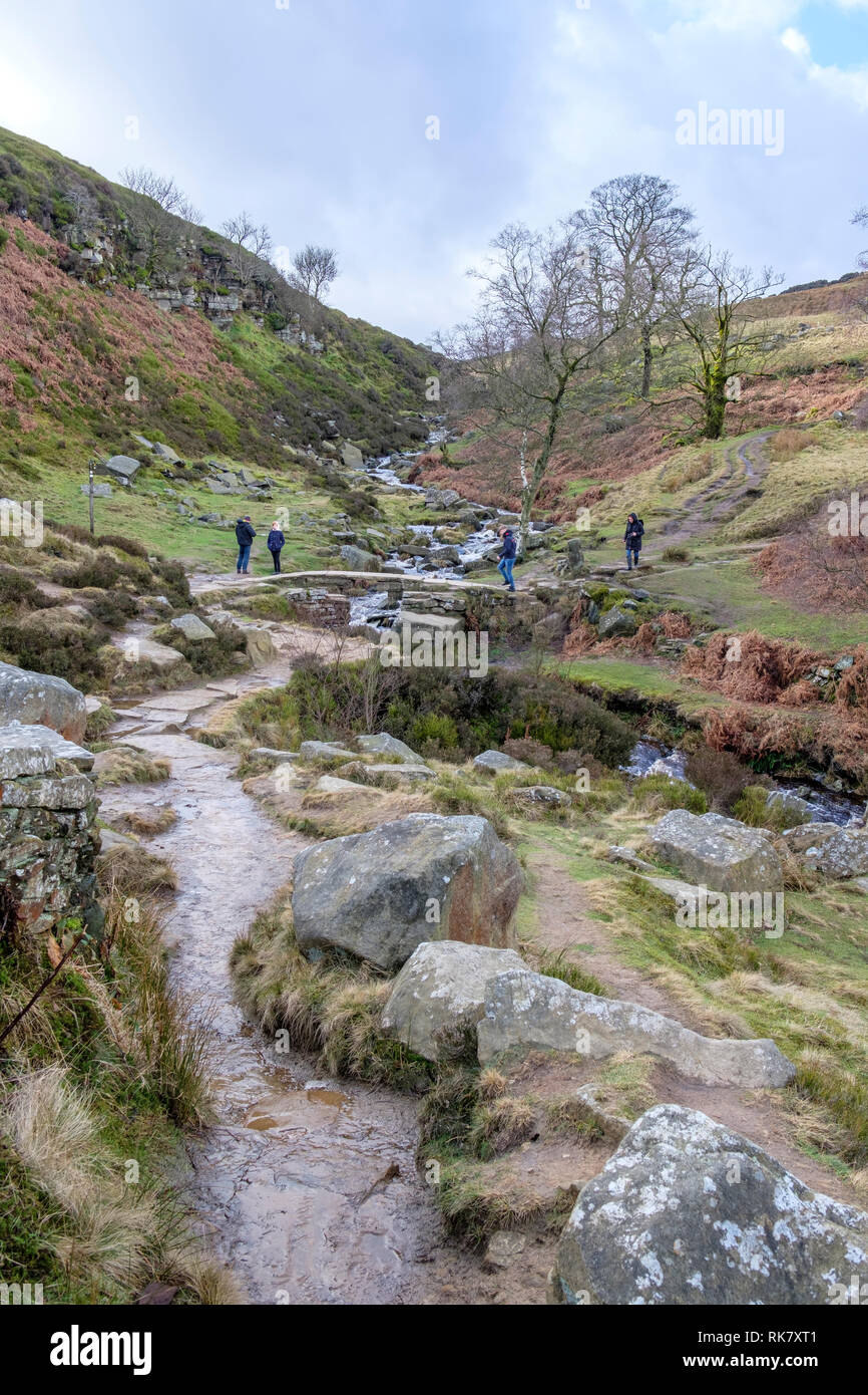 Tourists and Walkers at Bronte Bridge on The Bronte way on Haworth Moor ...