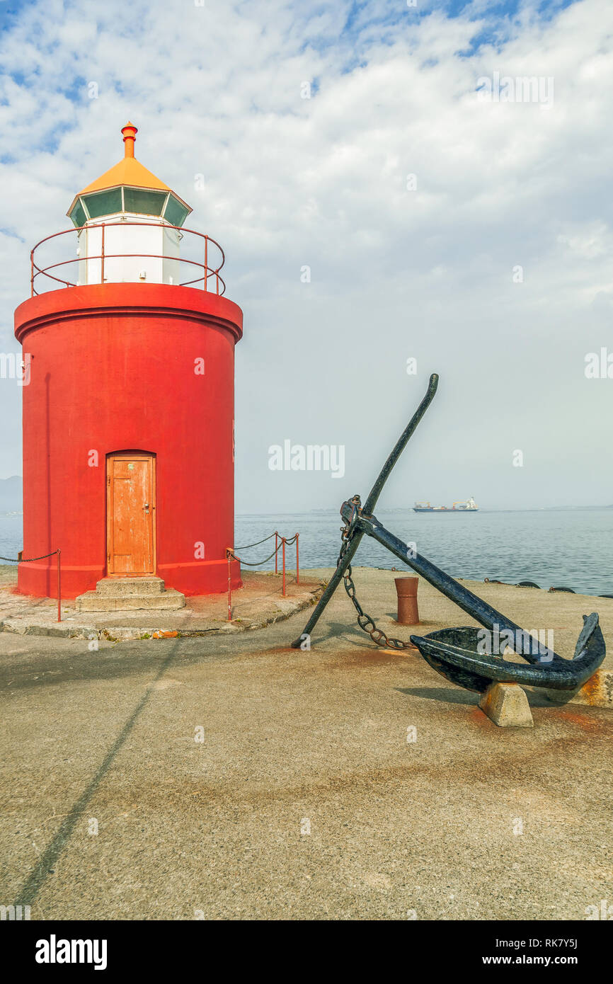 The old lighthouse Molja on the Harbour of Alesund. The lighthouse now ...