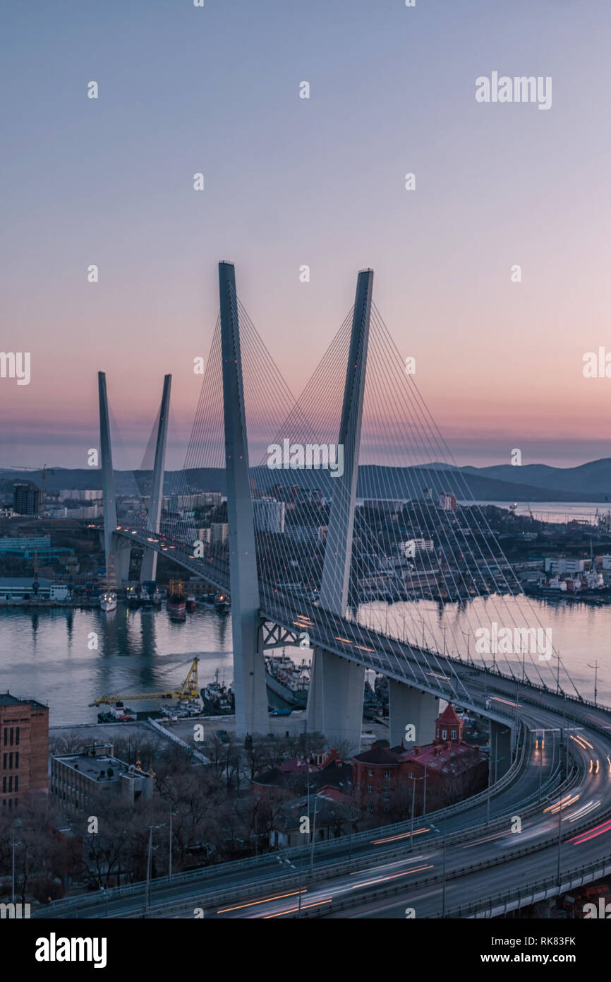 Golden bridge and Golden Horn bay at sunset, Vladivostok, Russia Stock ...