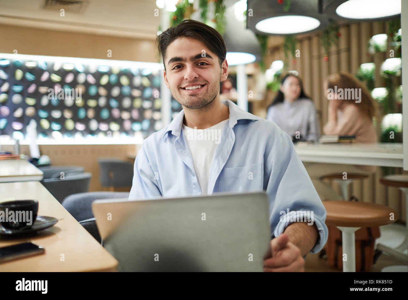 Student with laptop Stock Photo - Alamy