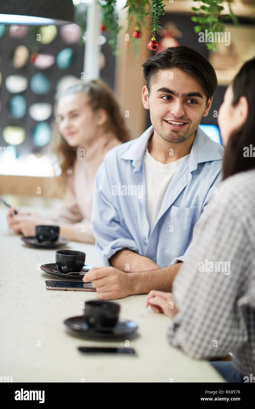 Talking to groupmate Stock Photo - Alamy