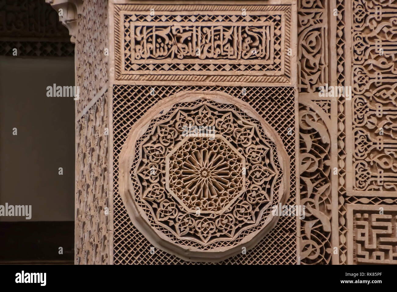 Islamic calligraphy and colorful geometric patterns Morocco Stock Photo ...