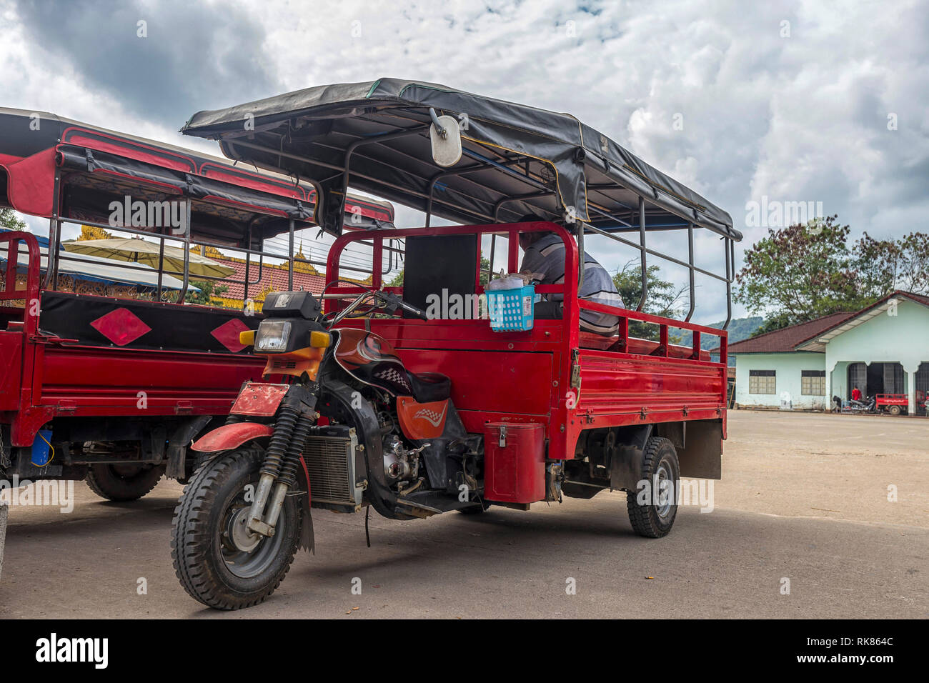 Traditional red tuk-tuk from Myanmar, Burma Stock Photo - Alamy