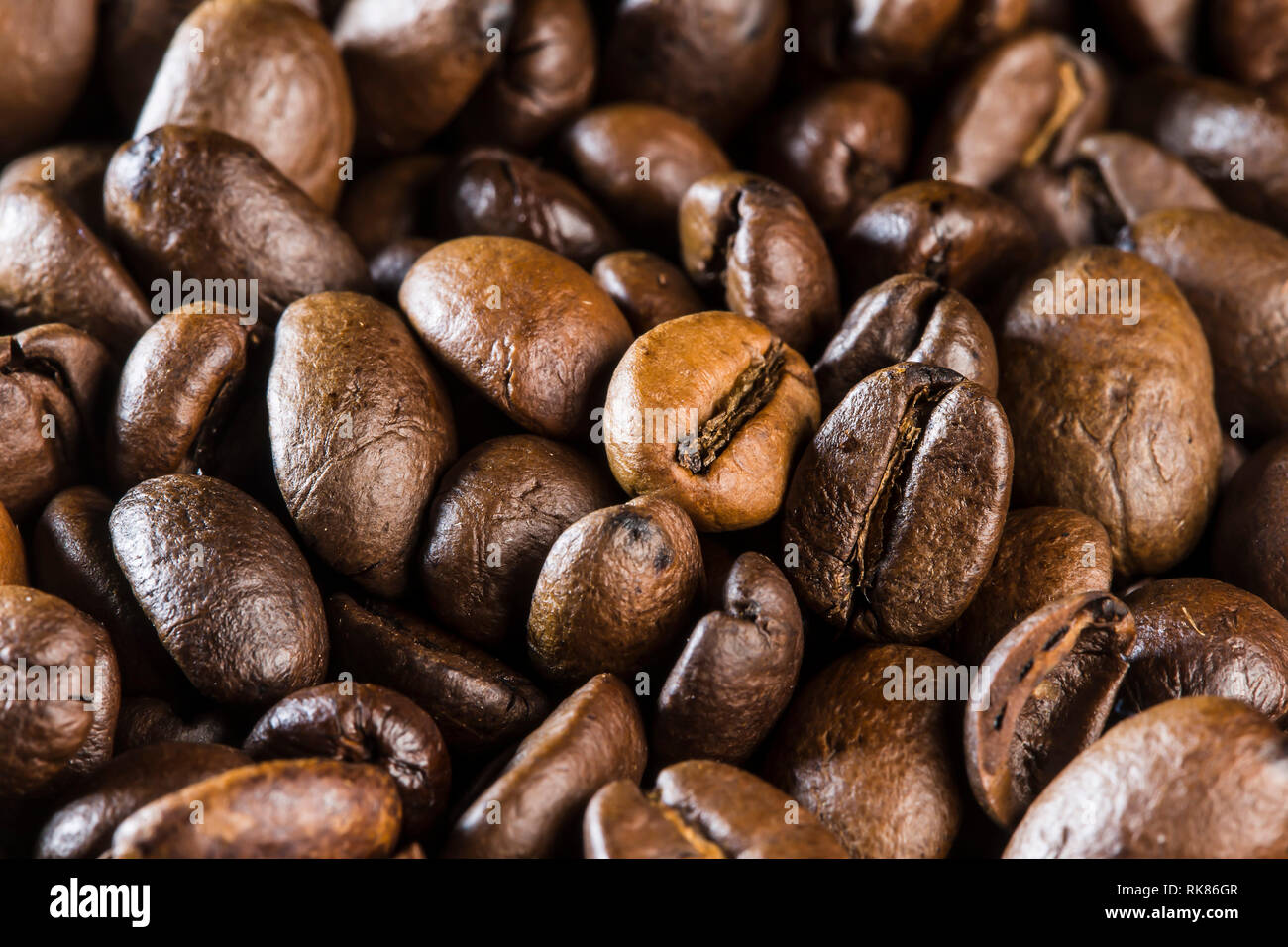 Coffee texture. Roasted coffee beans as background wallpaper. Gourmet ...