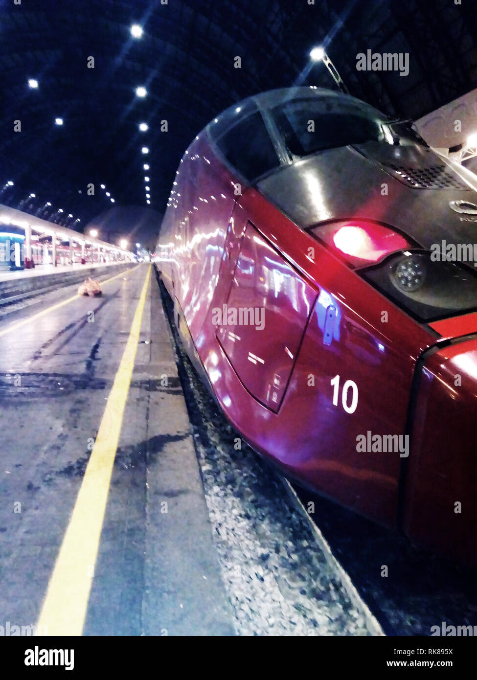 A high speed train Freccia Rossa parked in the railway station of ...