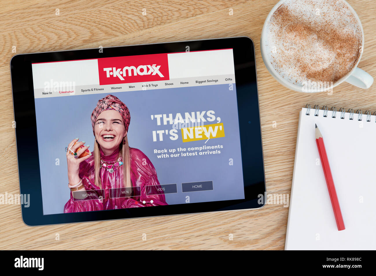 The TK Maxx website features on an iPad tablet device which rests on a ...