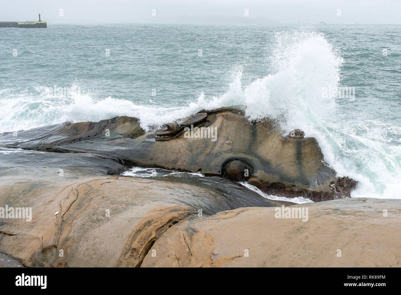 Yehliu Natural Landscape at Yehliu Geopark in Taiwan. Yehliu Geopark is ...
