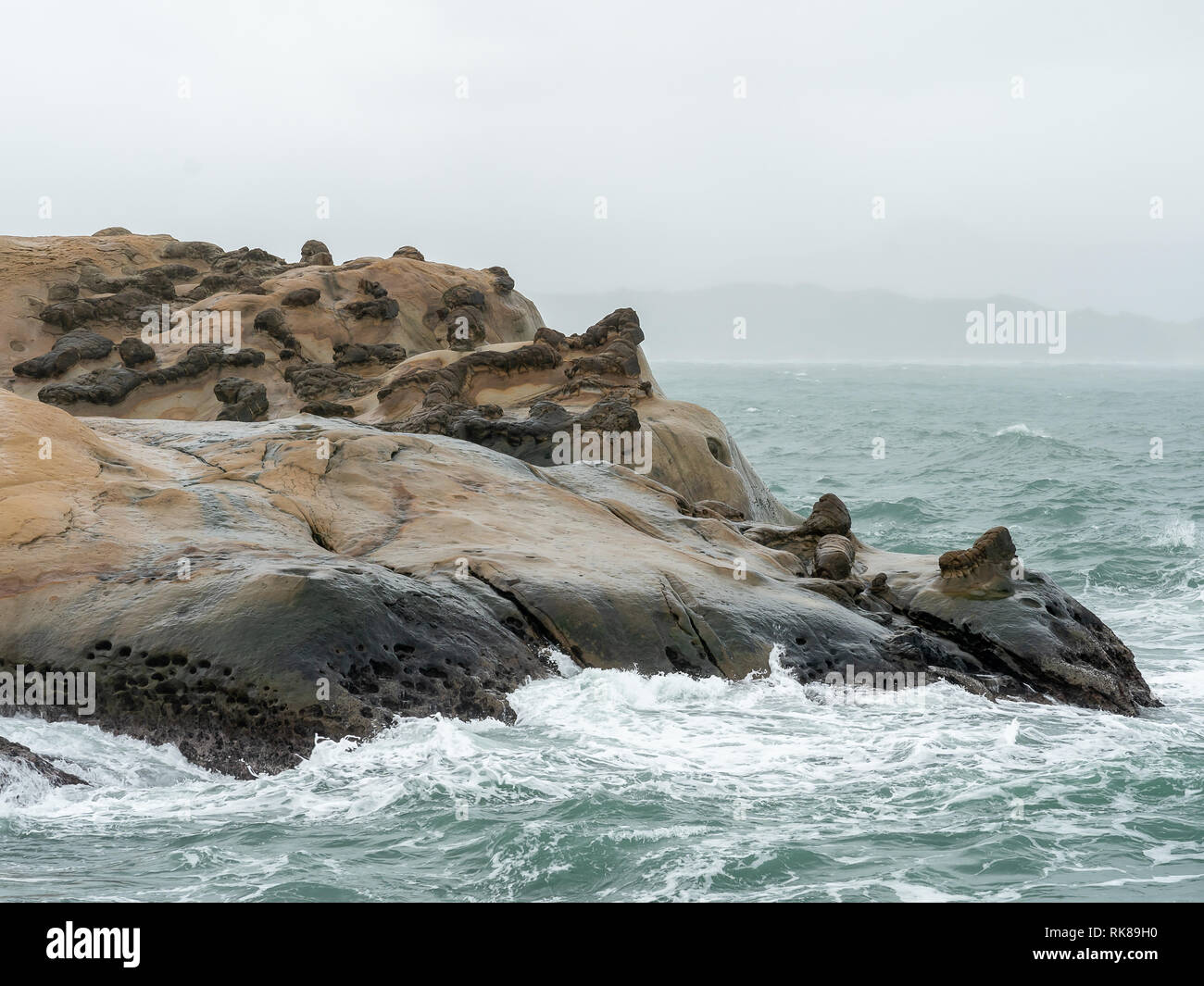 Yehliu Natural Landscape at Yehliu Geopark in Taiwan. Yehliu Geopark is ...
