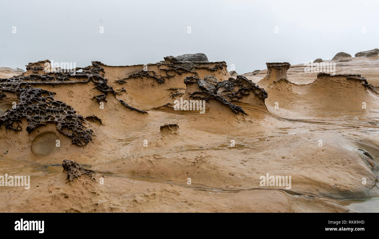 Honeycomb Weathering rock at Yehliu Geopark in Taiwan Stock Photo - Alamy