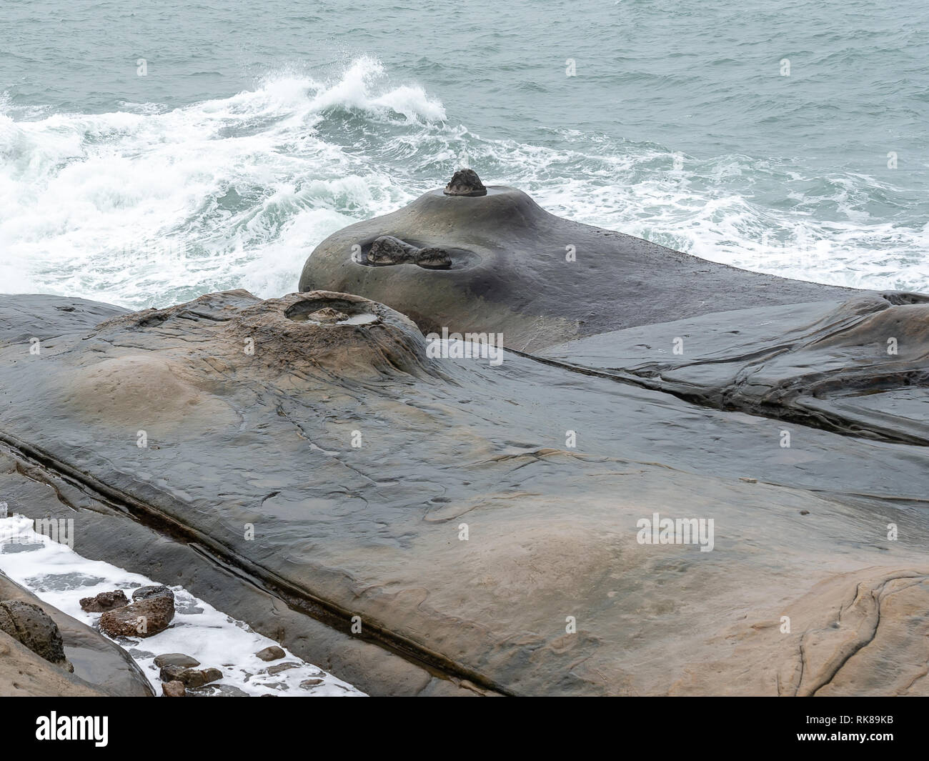 Yehliu Natural Landscape at Yehliu Geopark in Taiwan. Yehliu Geopark is ...
