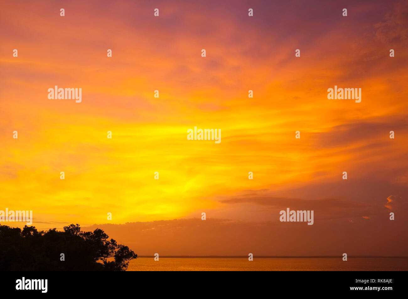 Orange sunset over Darwin Harbour in Darwin, Northern Territory ...