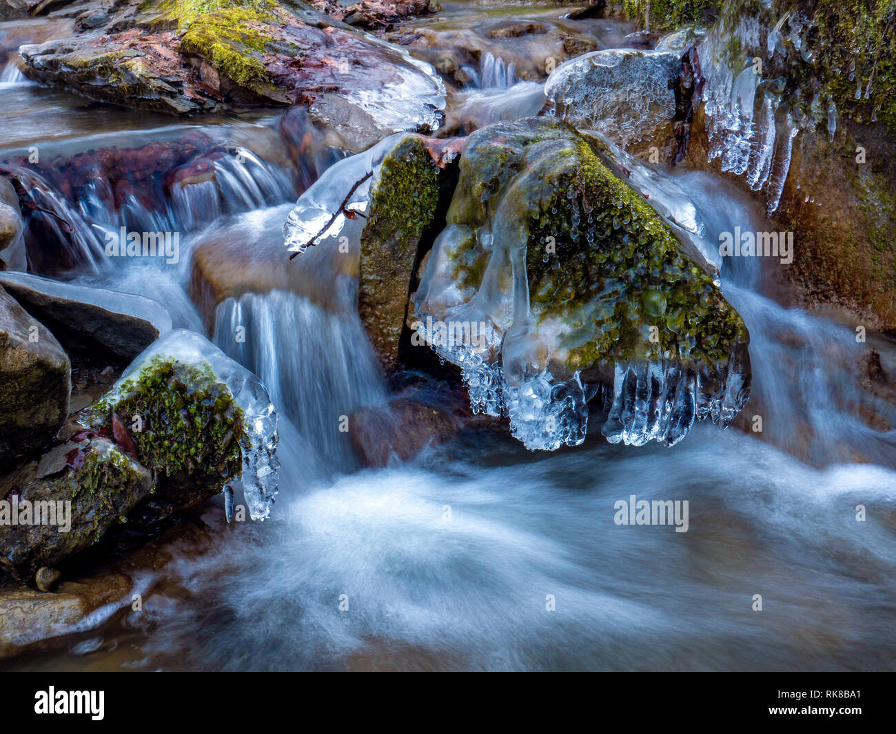Beautiful little waterfall in winter hi-res stock photography and ...
