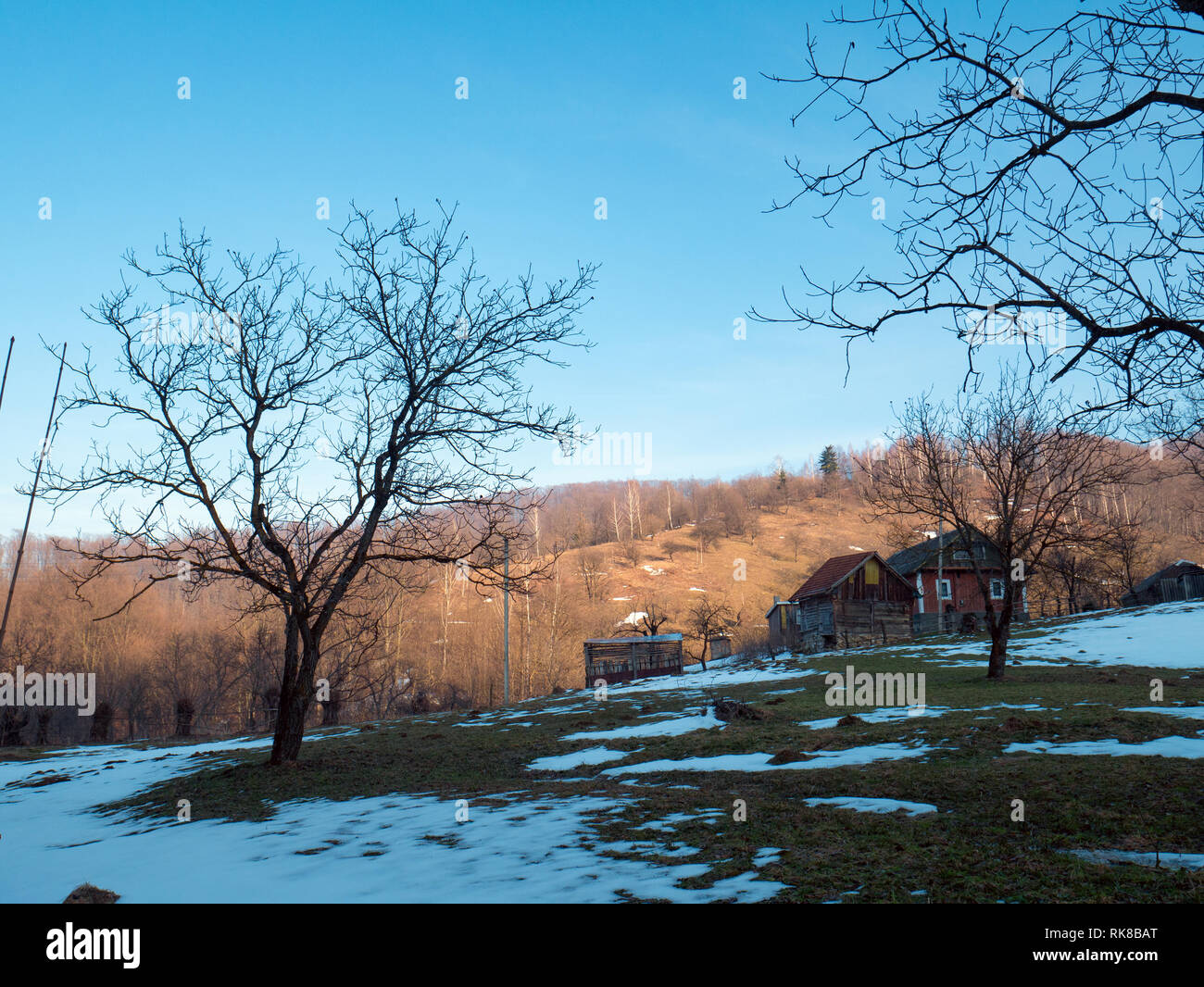 single house behind mountain Stock Photo - Alamy