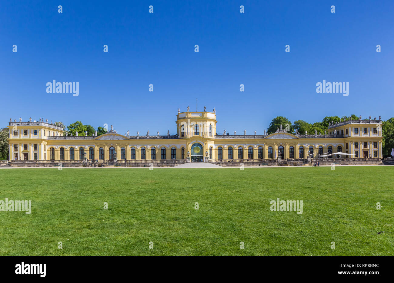 Yellow castle at the Karlswiese in Kassel, Germany Stock Photo - Alamy