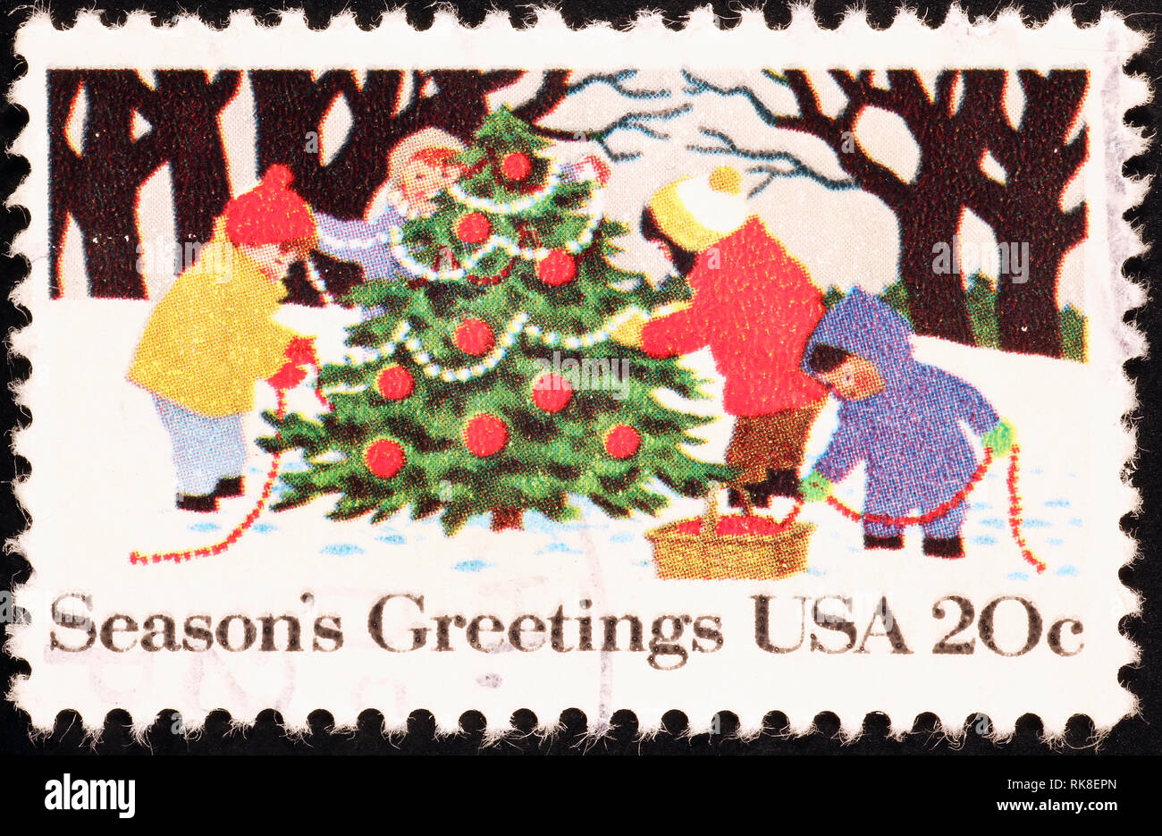 Christmas tree and children on american postage stamp Stock Photo - Alamy