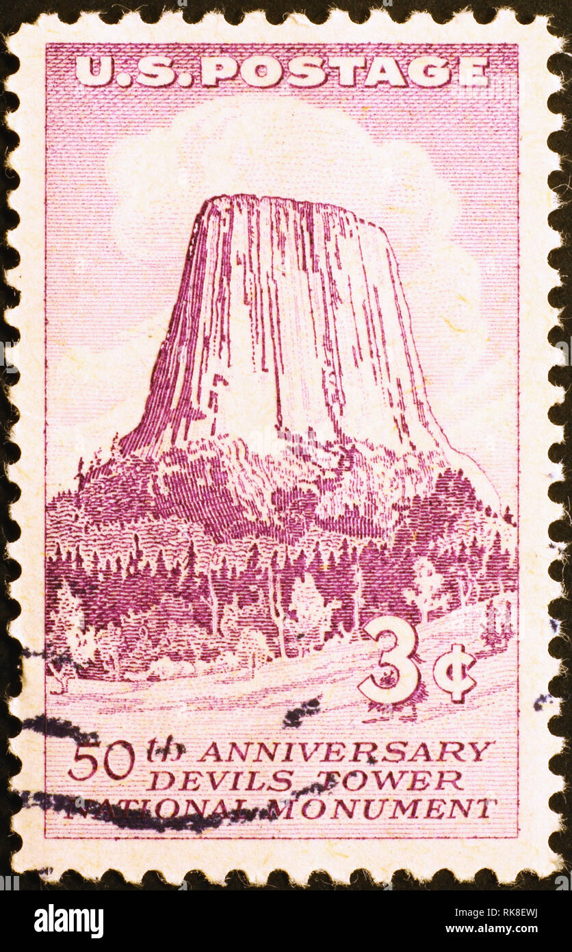 Devils tower on old american postage stamp Stock Photo - Alamy