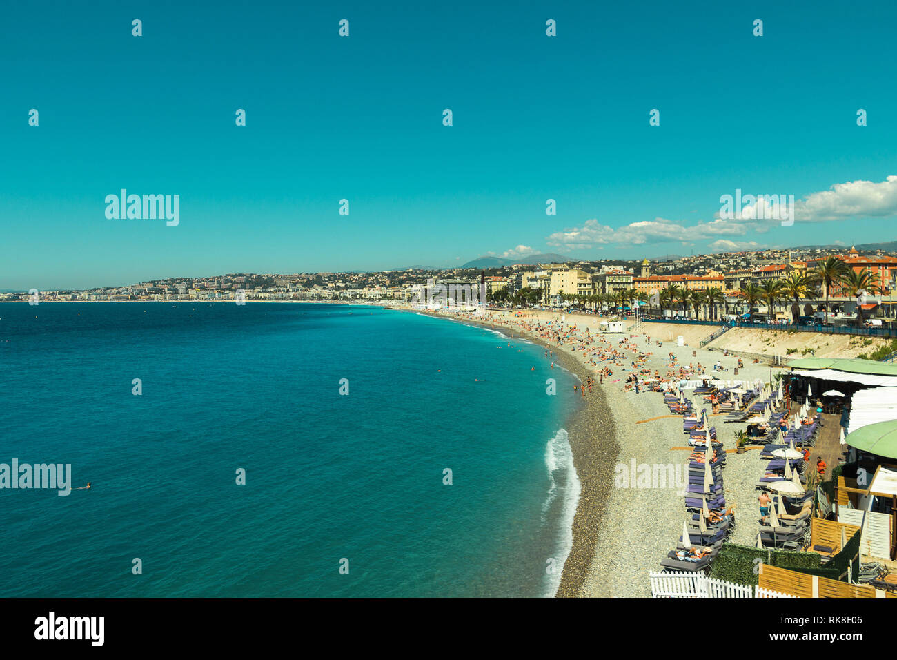 Crowded Mediterranean summer beach in City of Nice, France Stock Photo ...