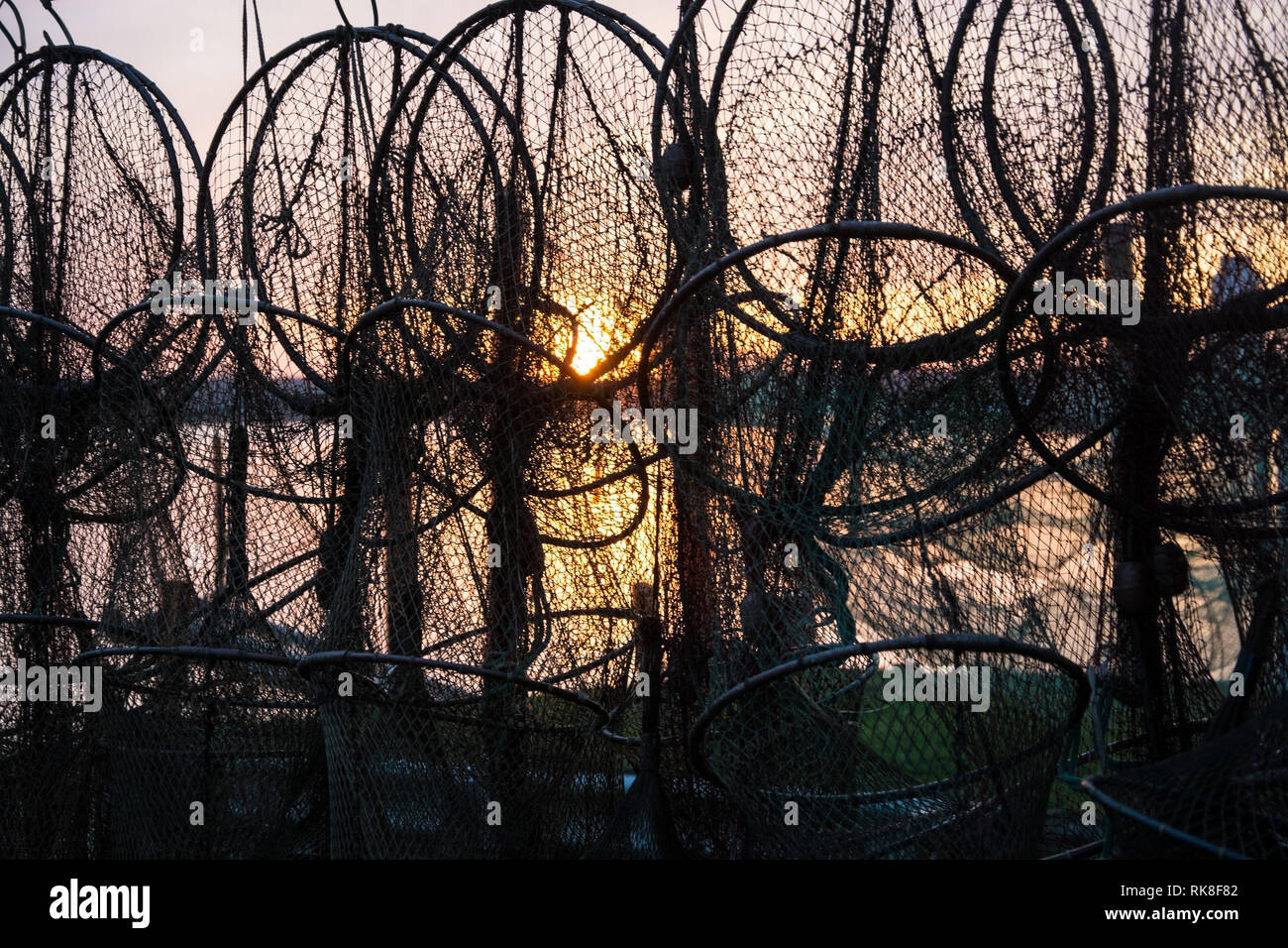 A fish trap is a stationary trap used for fishing Stock Photo - Alamy