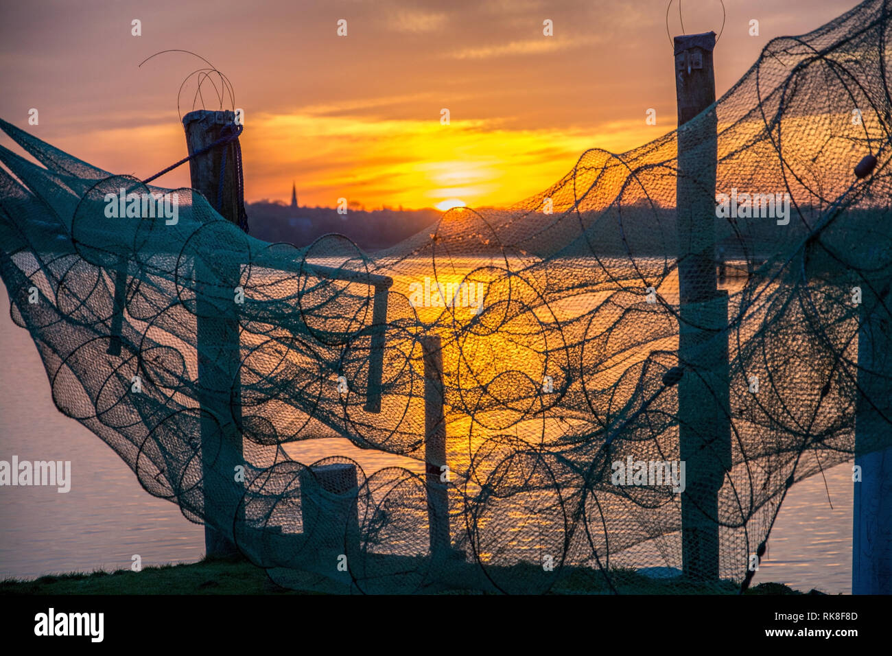 A fish trap is a stationary trap used for fishing Stock Photo - Alamy