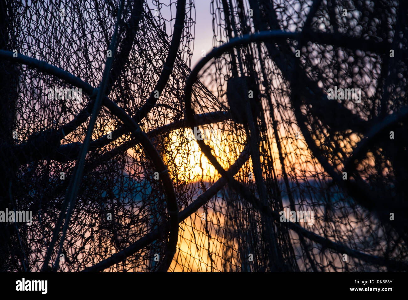 A fish trap is a stationary trap used for fishing Stock Photo - Alamy