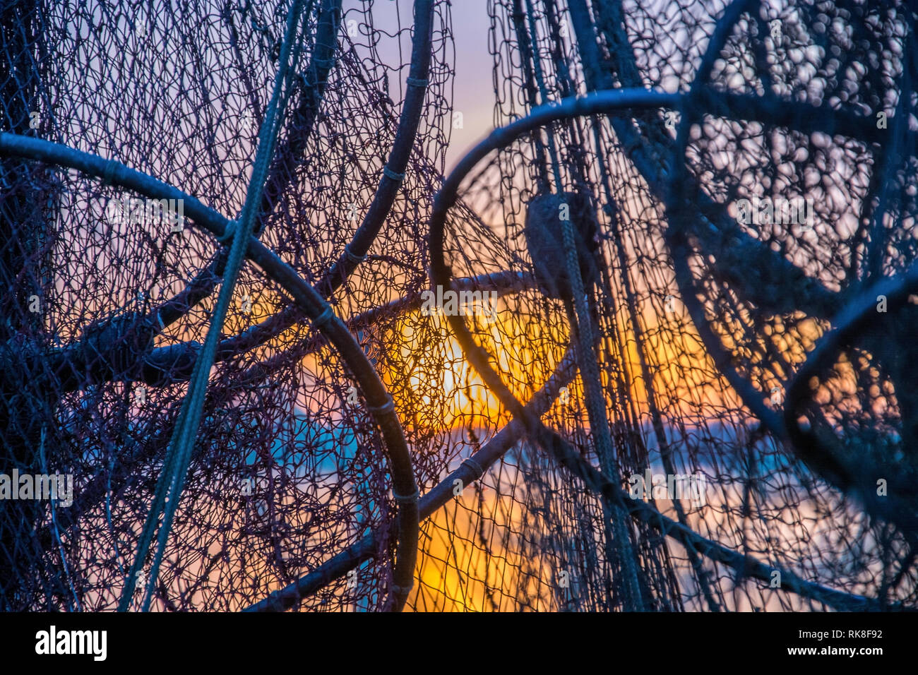 A fish trap is a stationary trap used for fishing Stock Photo - Alamy