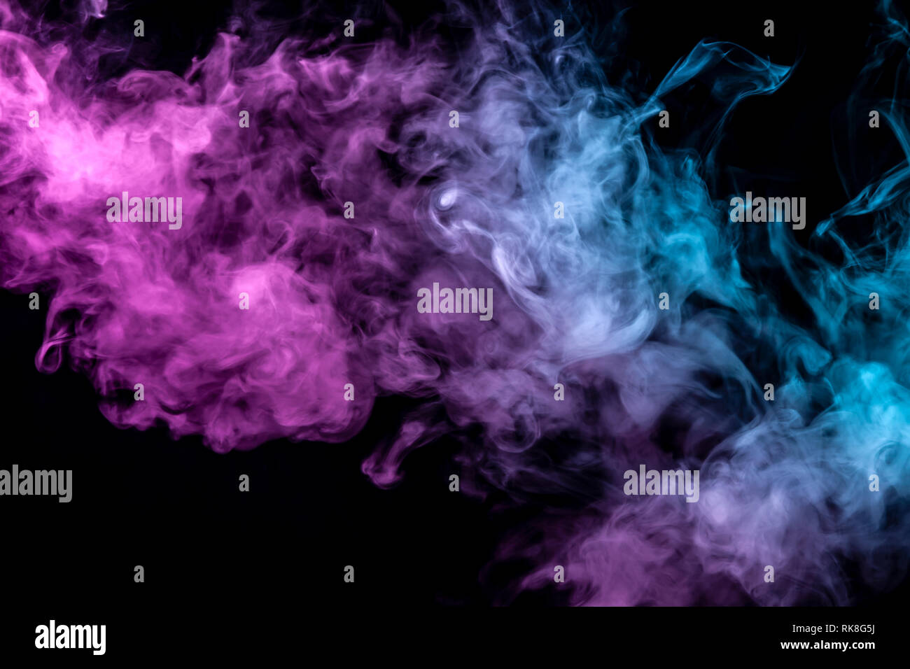 Translucent, thick smoke, illuminated by light against a dark ...